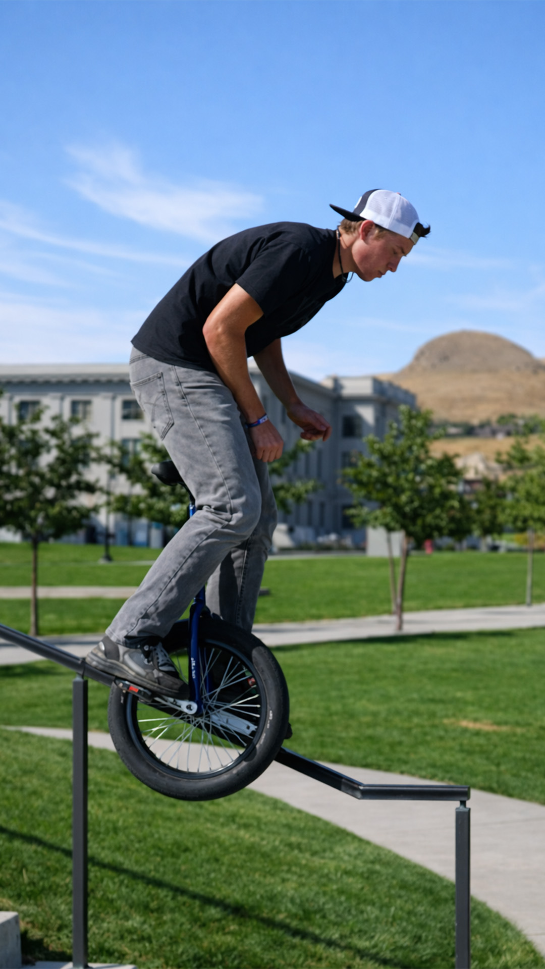 Riding a unicycle in action