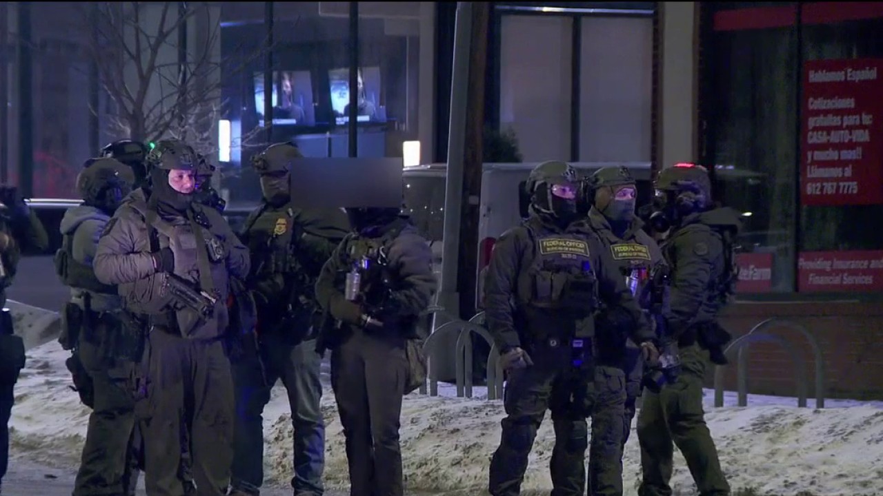 Anti-ICE protesters clash with law enforcement outside hotel in Minneapolis