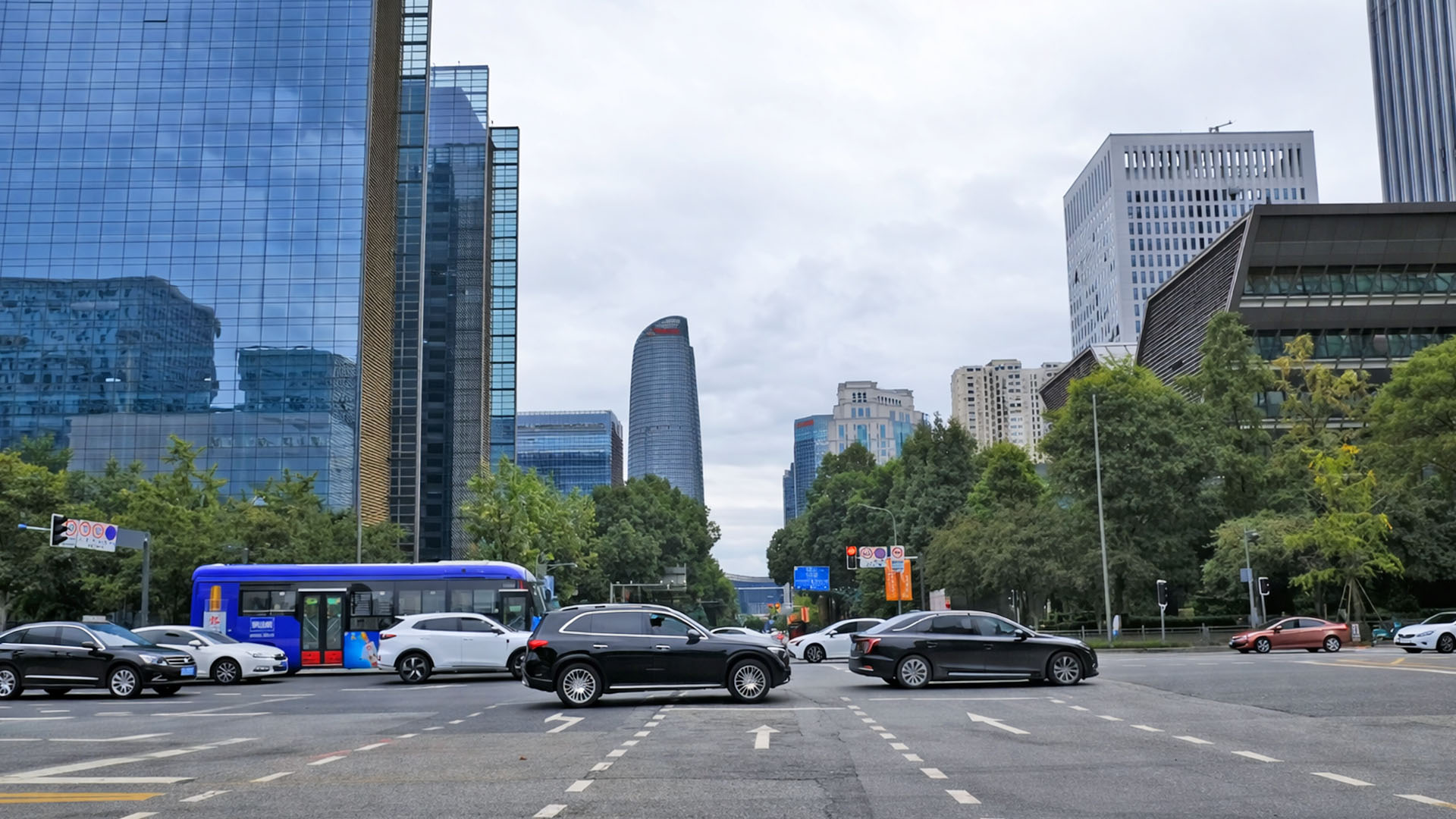 Glass towers rise behind Chengdu streets