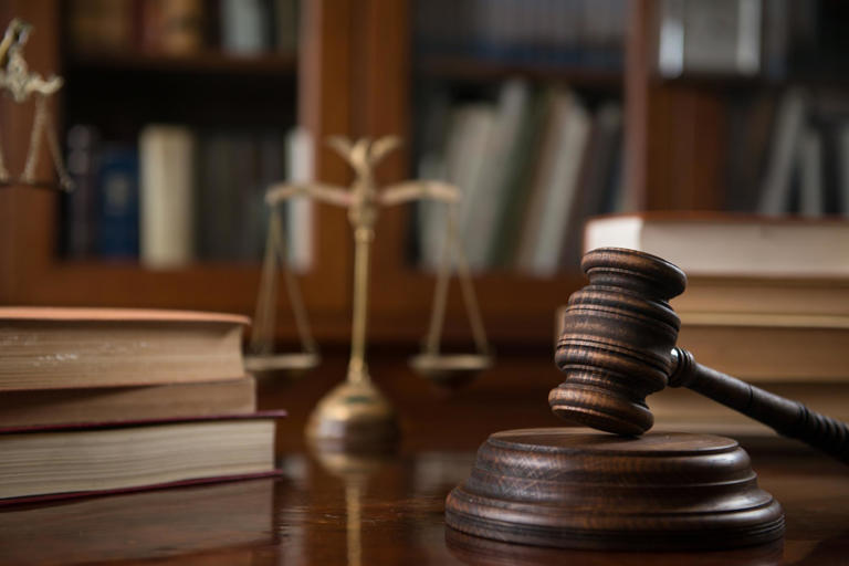 Allegations of fly-tipping against a Wigan woman have been withdrawn