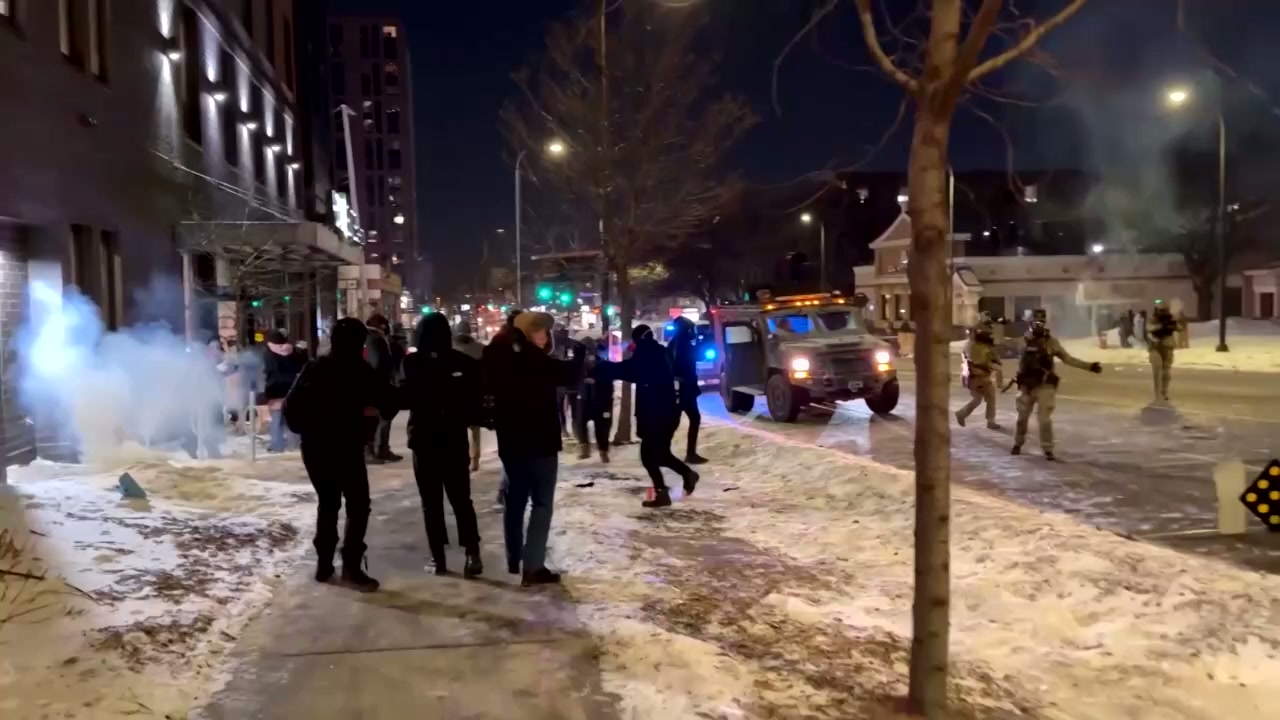 Security forces throw smoke bombs at protesters in Minneapolis