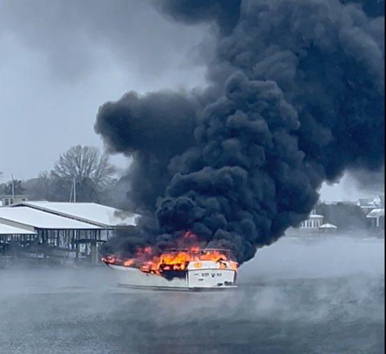 Video: Large cabin cruiser boat erupts in flames in North Carolina