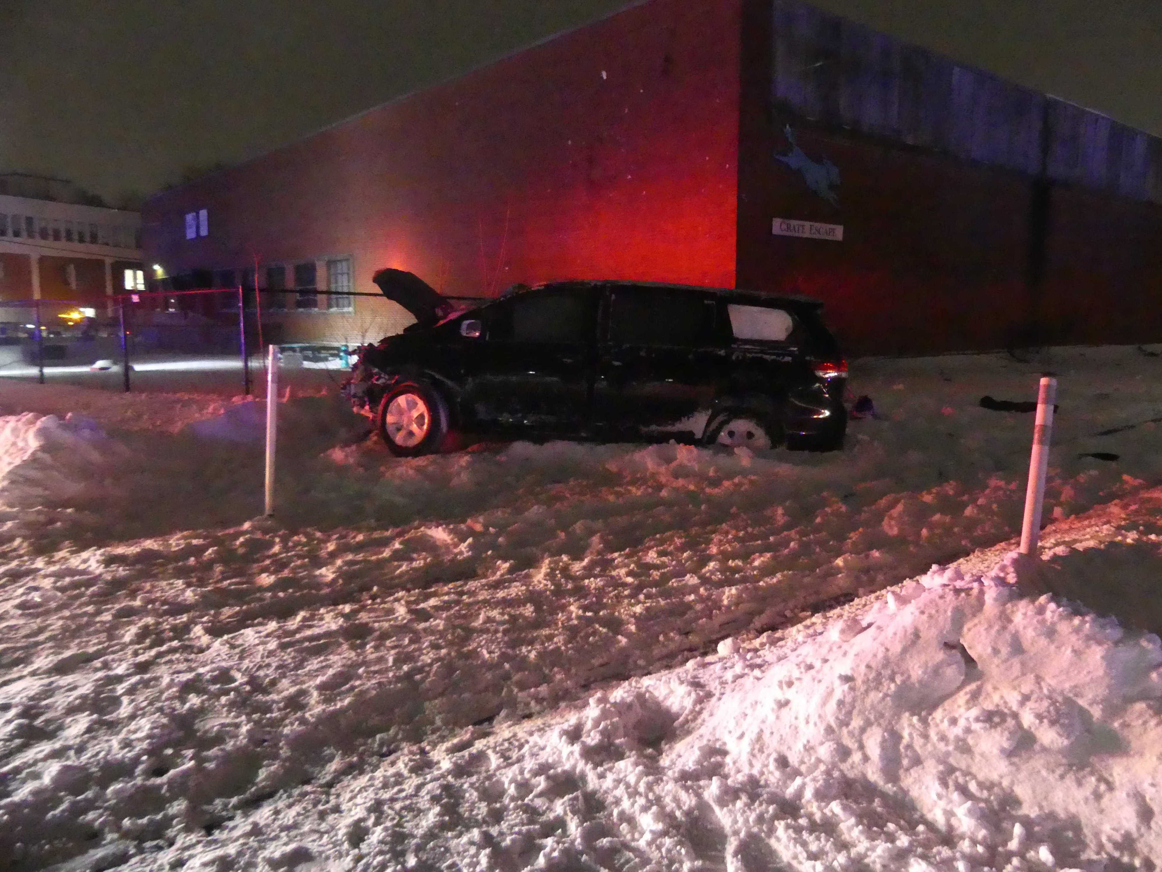 Minivan struck by commuter rail train after getting stuck on tracks ...