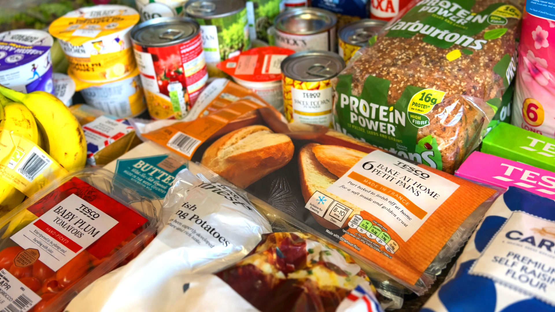 Family grocery shopping at Tesco Scotland