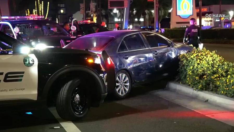 Possible suspect arrested after man stabbed, run over in Orange County