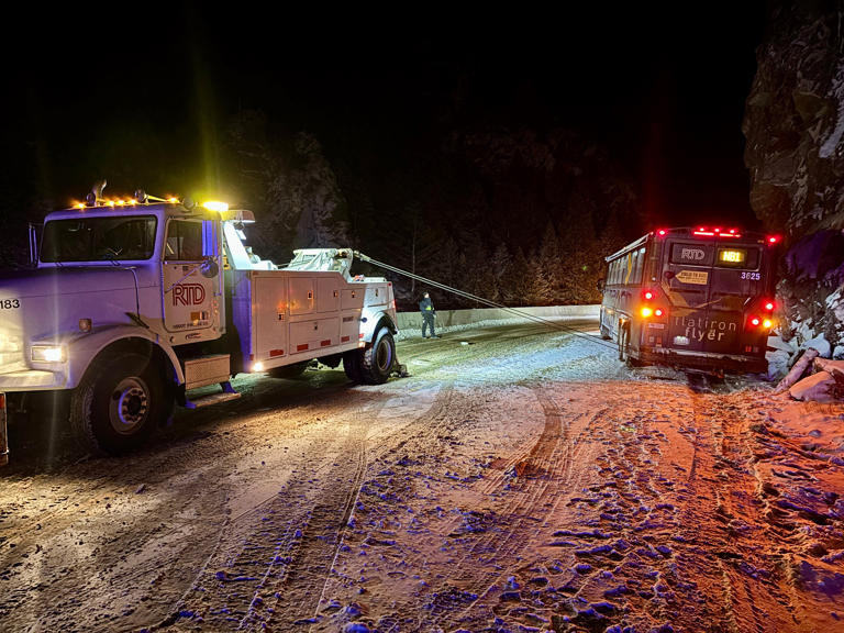 City bus gets stuck on snowy road near Boulder