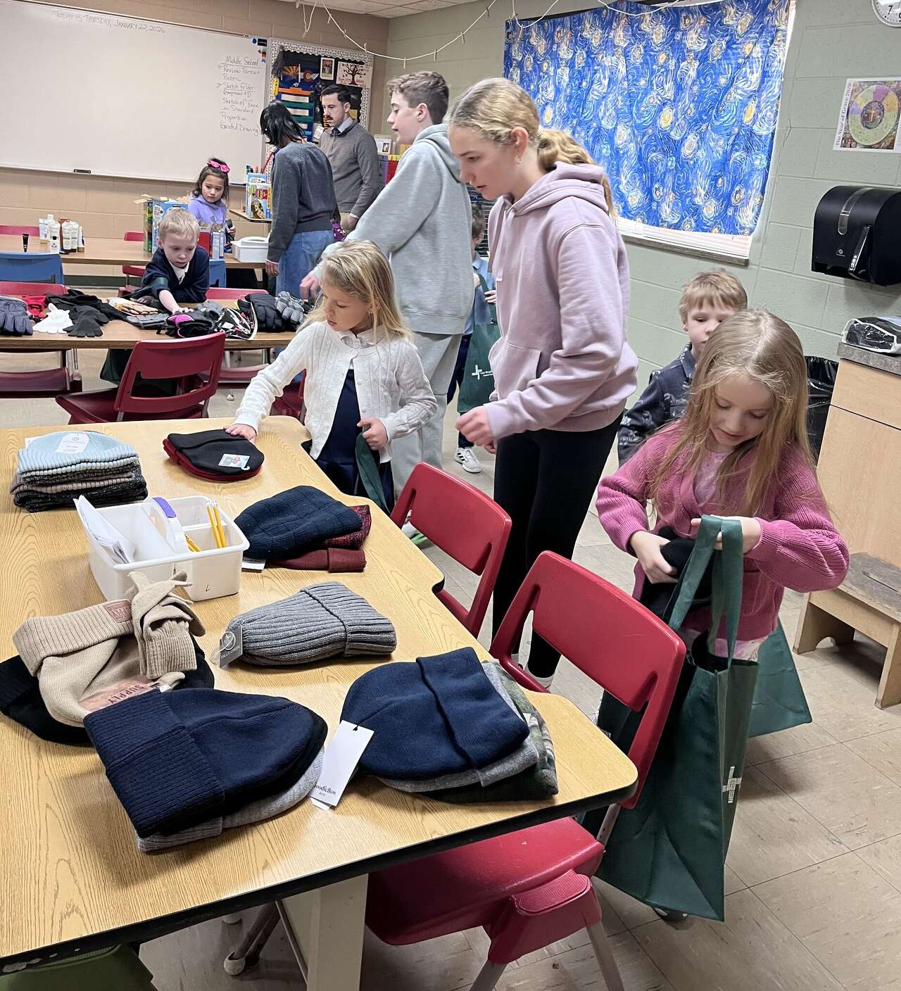 St. Brigid students assemble 30 blessing bags for Open Door during ...