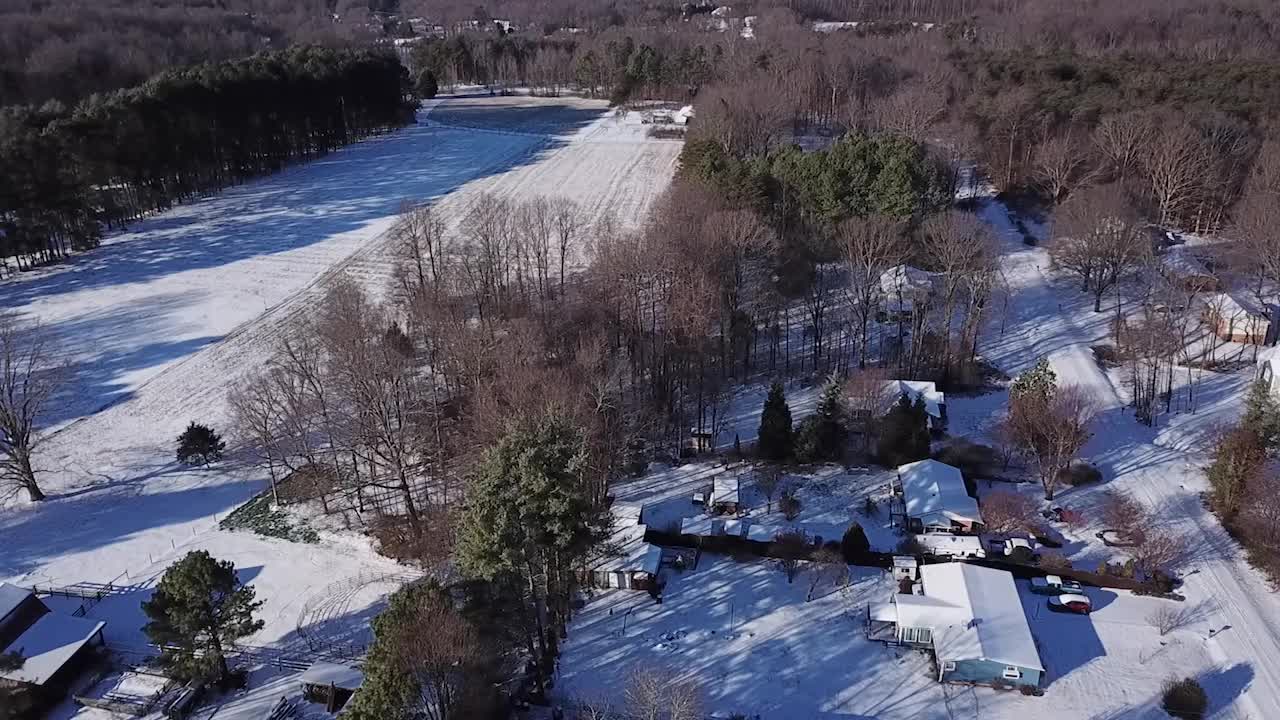 Drone footage shows snowy conditions in Forsyth County along Stigall Road