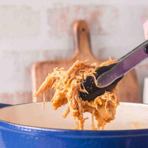 Dutch oven shredded chicken recipe for easy homestead meals