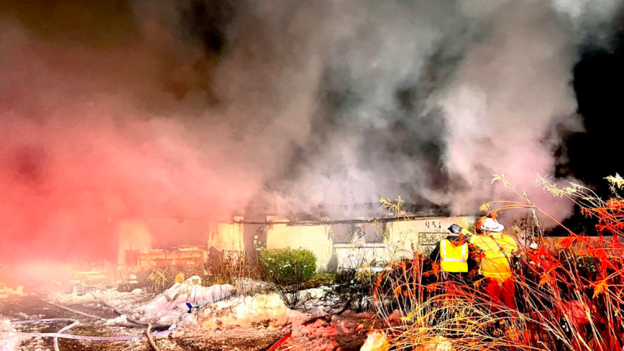 Photos: Fairmont home intentionally set on fire, 1 arrested