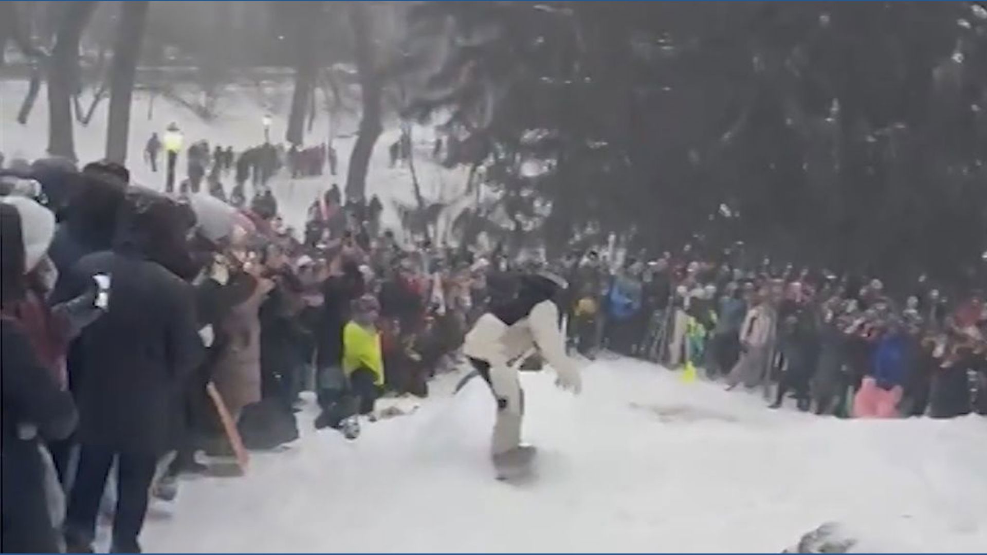 Olympic snowboarder Shaun White jumps over comic Shane Gillis in snowy ...