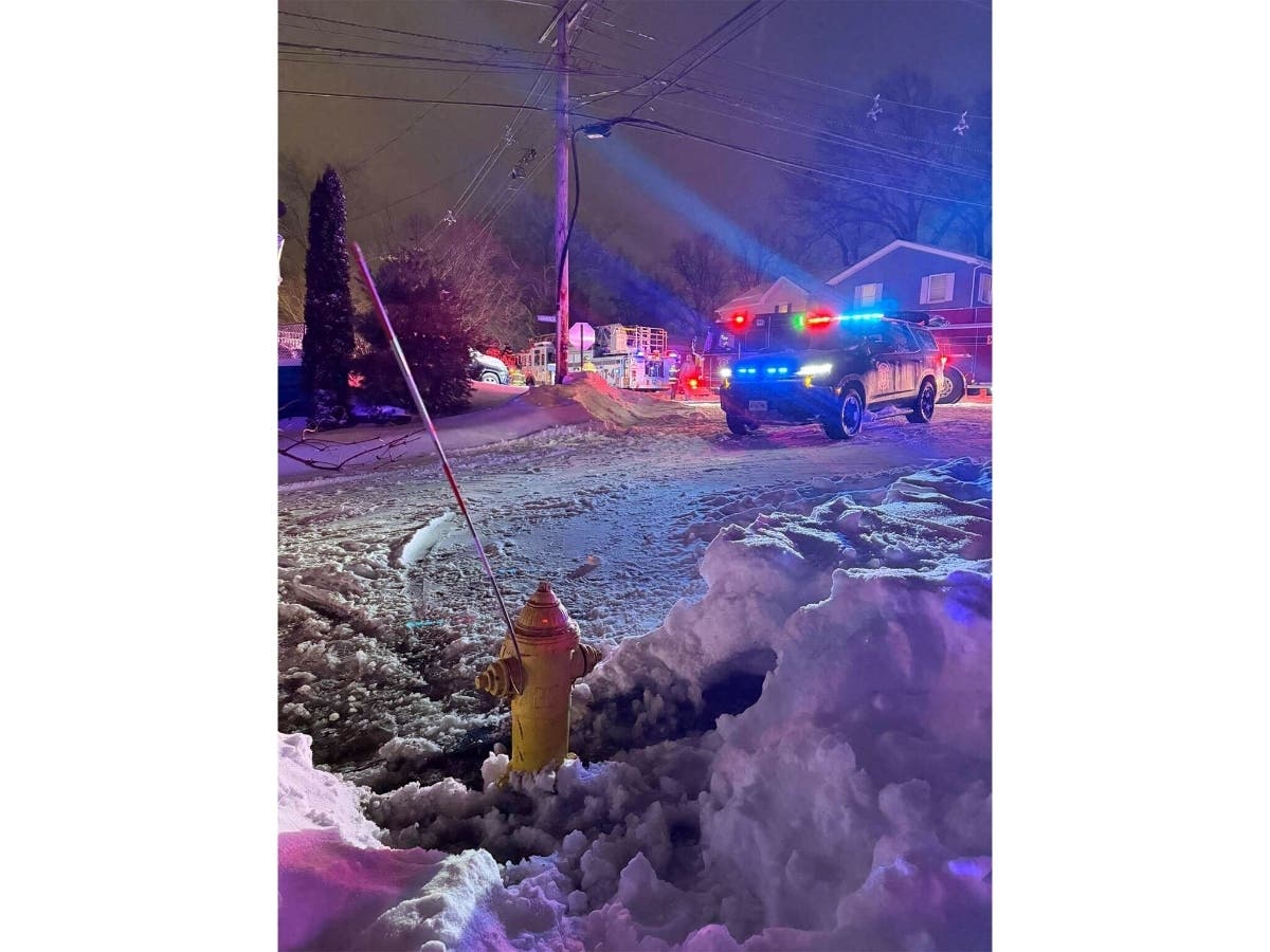 Fire engulfs Wayne home after storm, hydrant under 2 feet of snow