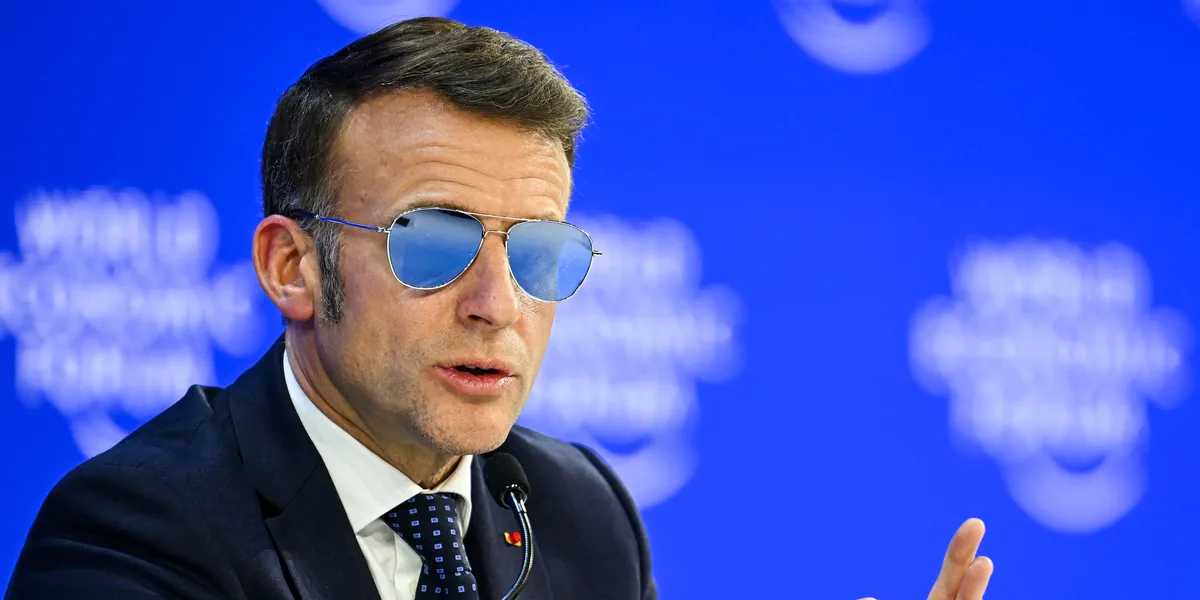 Why won't Macron remove his sunglasses at the World Economic Forum?