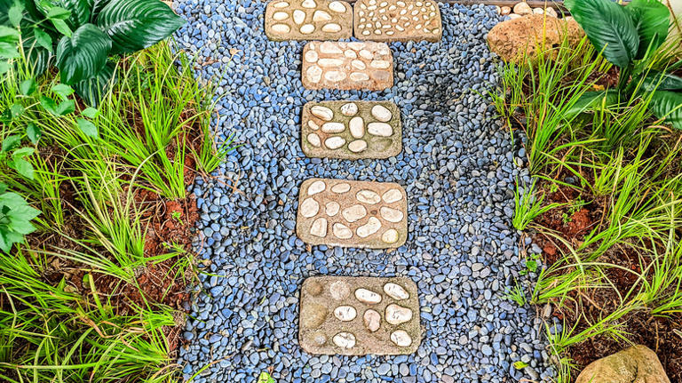 Add a fun personal touch to your yard with these DIY stepping stone ideas