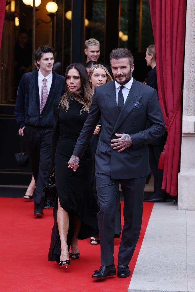 Victoria Beckham rocks thigh-high slit LBD for outing with David and ...