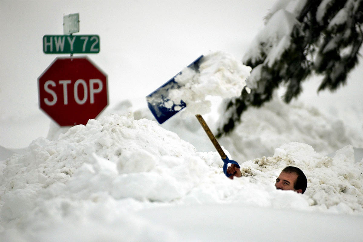 The best stretches for back relief after shoveling snow