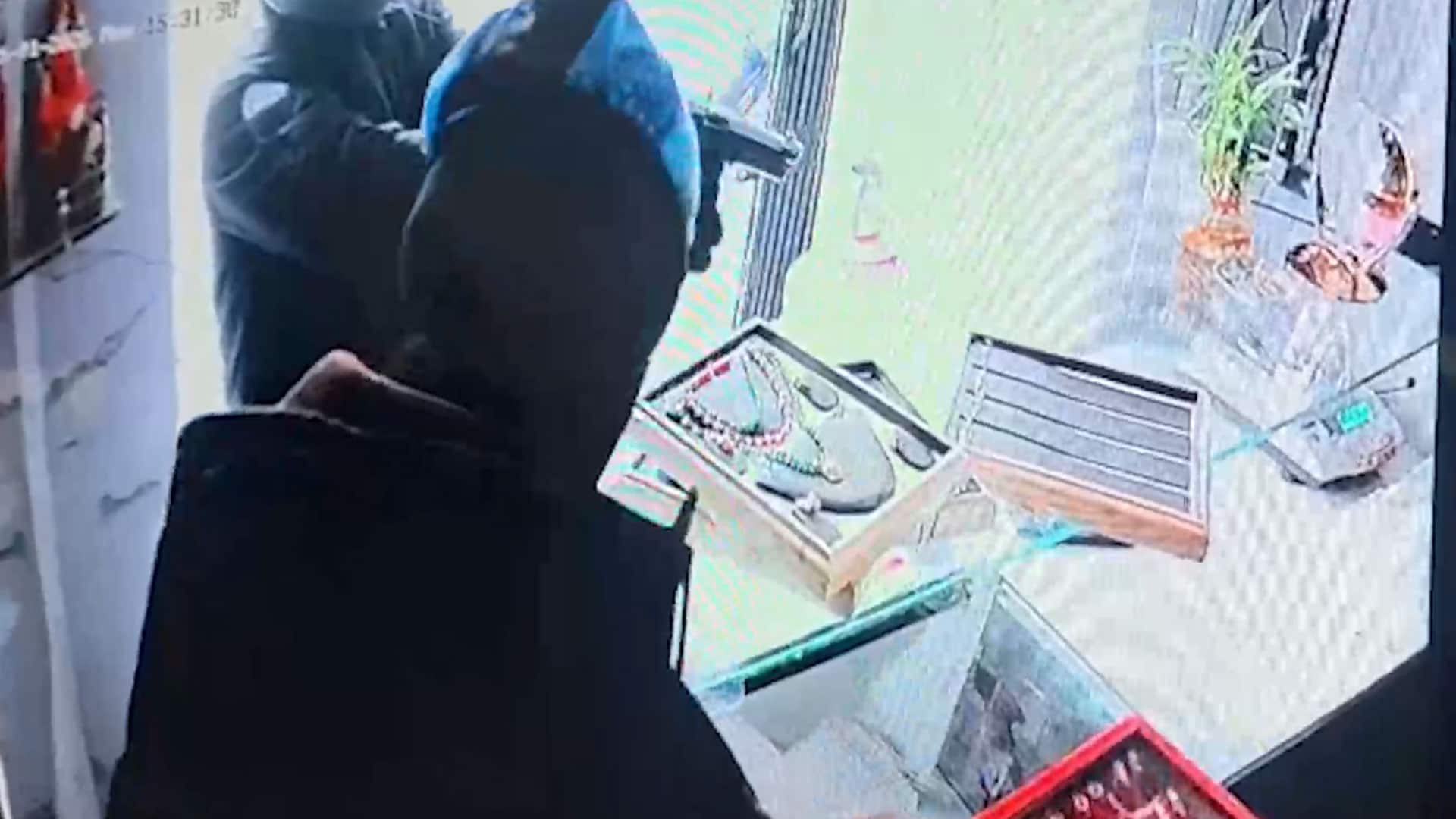 Watch: Masked men rob jewellery store at gunpoint in Karnataka