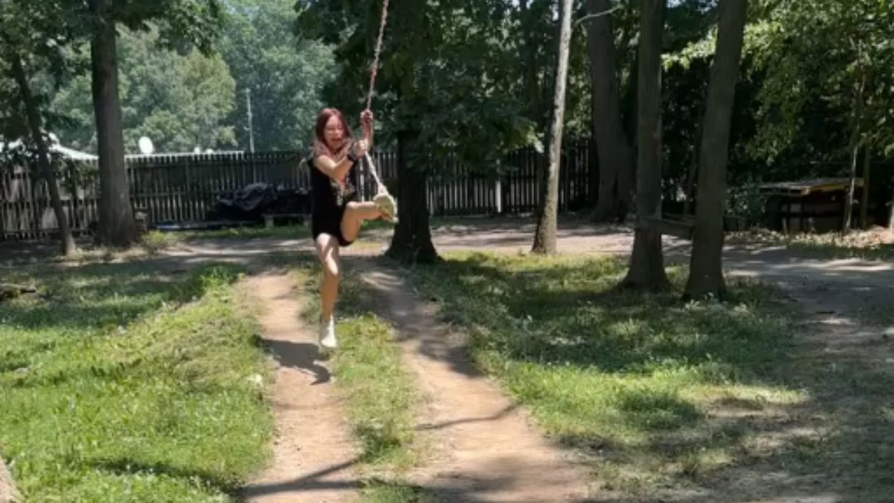Backyard rope swing adventure turns into hilarious fall as girl brings ...