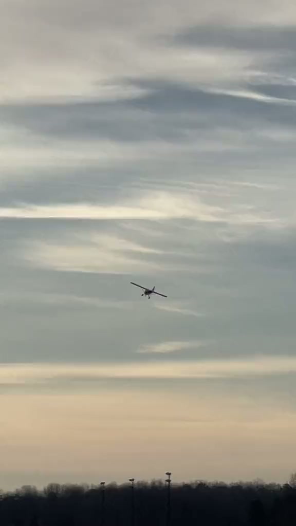 RC Beaver bush plane skims the runway in a close low pass