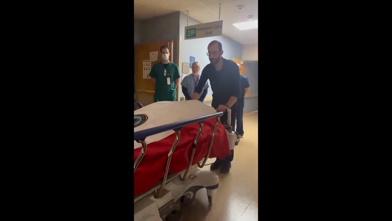 Videos shows ICU nurse Alex Pretti honoring veteran in final salute in 2024