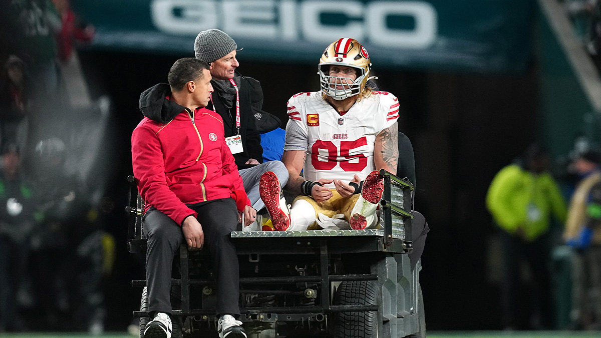 Watch 49ers star tight end George Kittle attempt to golf after Achilles ...