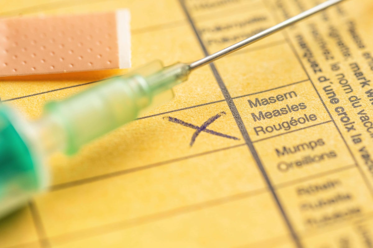 What is measles and how does it spread?