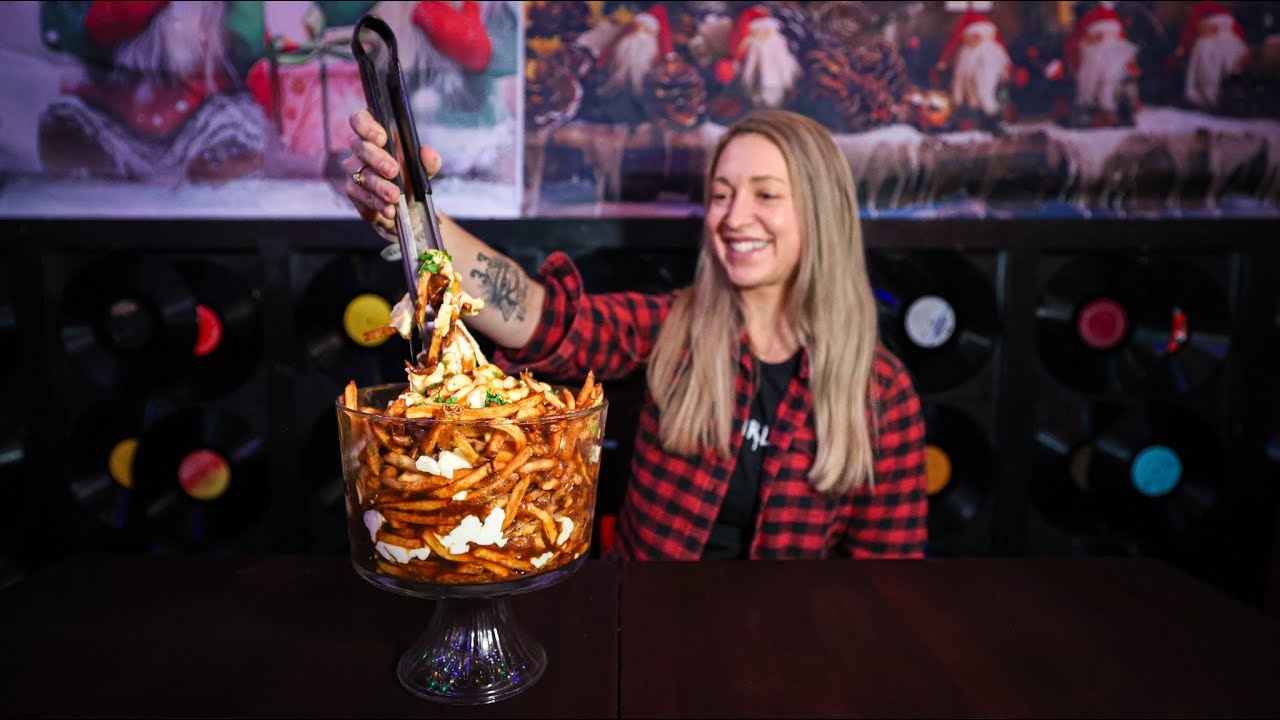 Girl attempting Canada's largest poutine - food challenge
