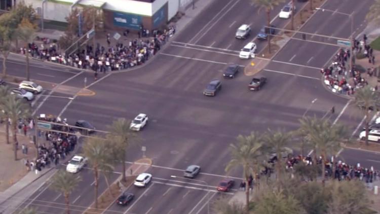 High school demonstrators assemble in downtown Chandler to protest ICE ...