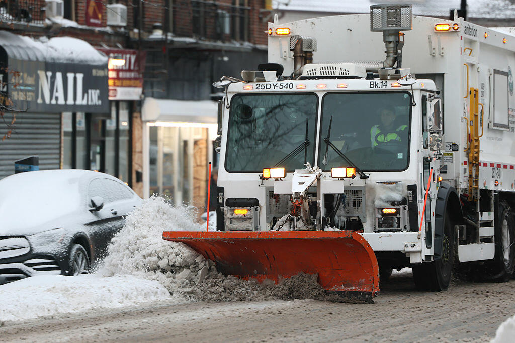 How do "New York's Strongest" do the heavy lifting of snow removal?