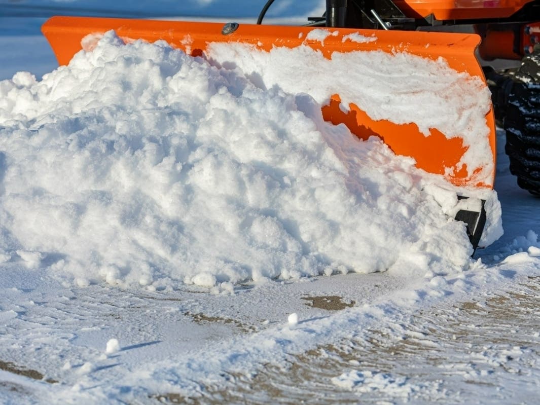 Brick digging out after storm drops nearly a foot of snow