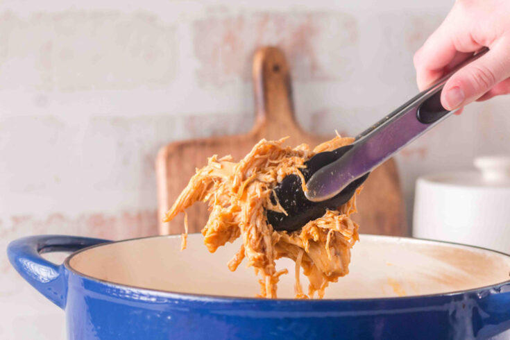 Dutch oven shredded chicken recipe for easy homestead meals