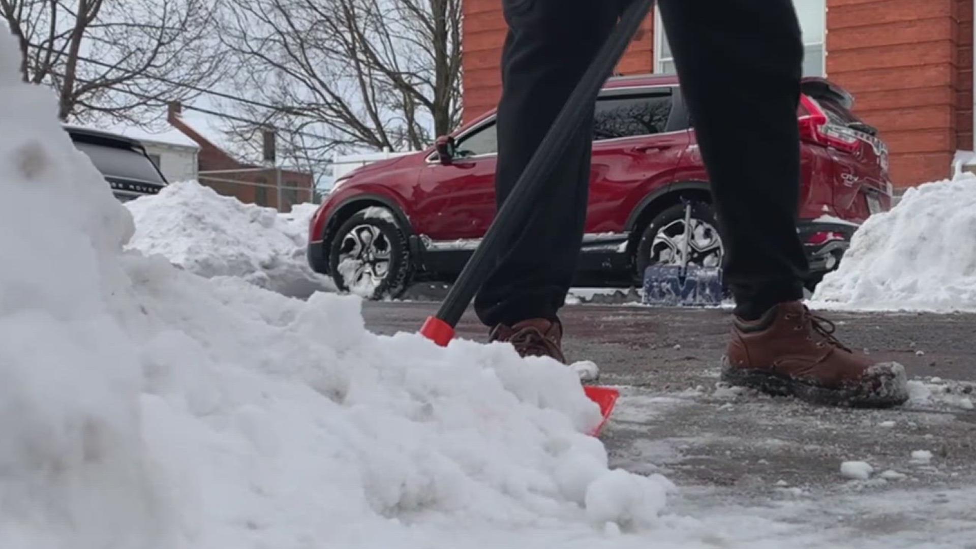 Lancaster residents begin to clean up after Sunday’s snowstorm