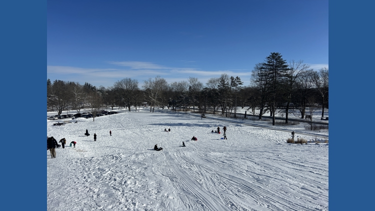Snow day fun: families flock to Side Cut Metropark