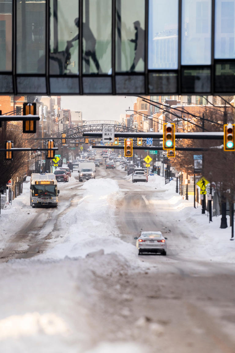 Snow crews are plowing downtown streets differently. Here's why