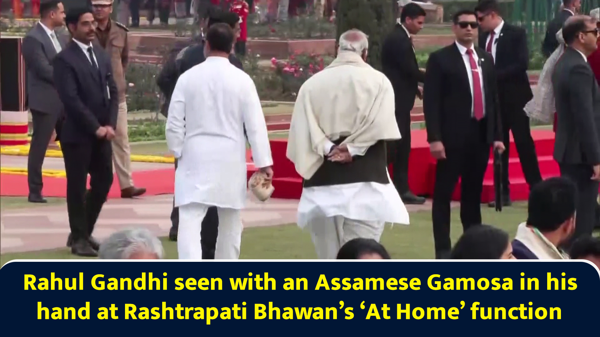 Rahul Gandhi seen with an Assamese gamosa in his hand at Rashtrapati ...