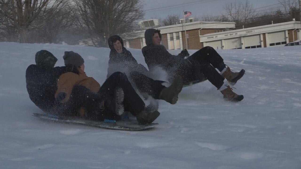 Harrisonburg students spend snow day sledding hillside at Keister ...