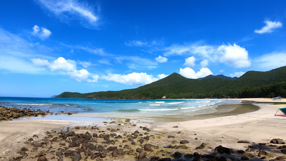 A quiet walk along a wide beach