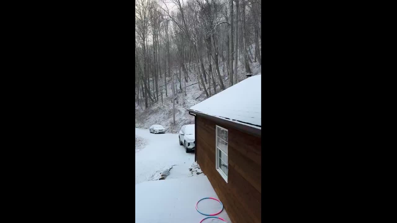 Modest snowfall at 4,000 feet in Haywood, North Carolina, USA