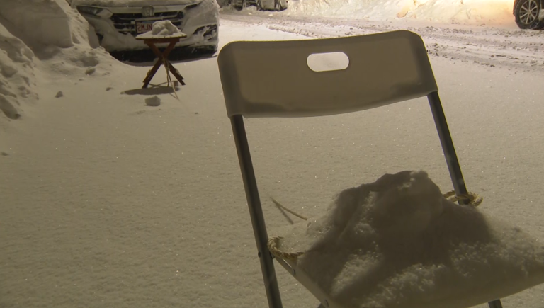 Drivers rush to use space savers as parking ban lifted in Boston