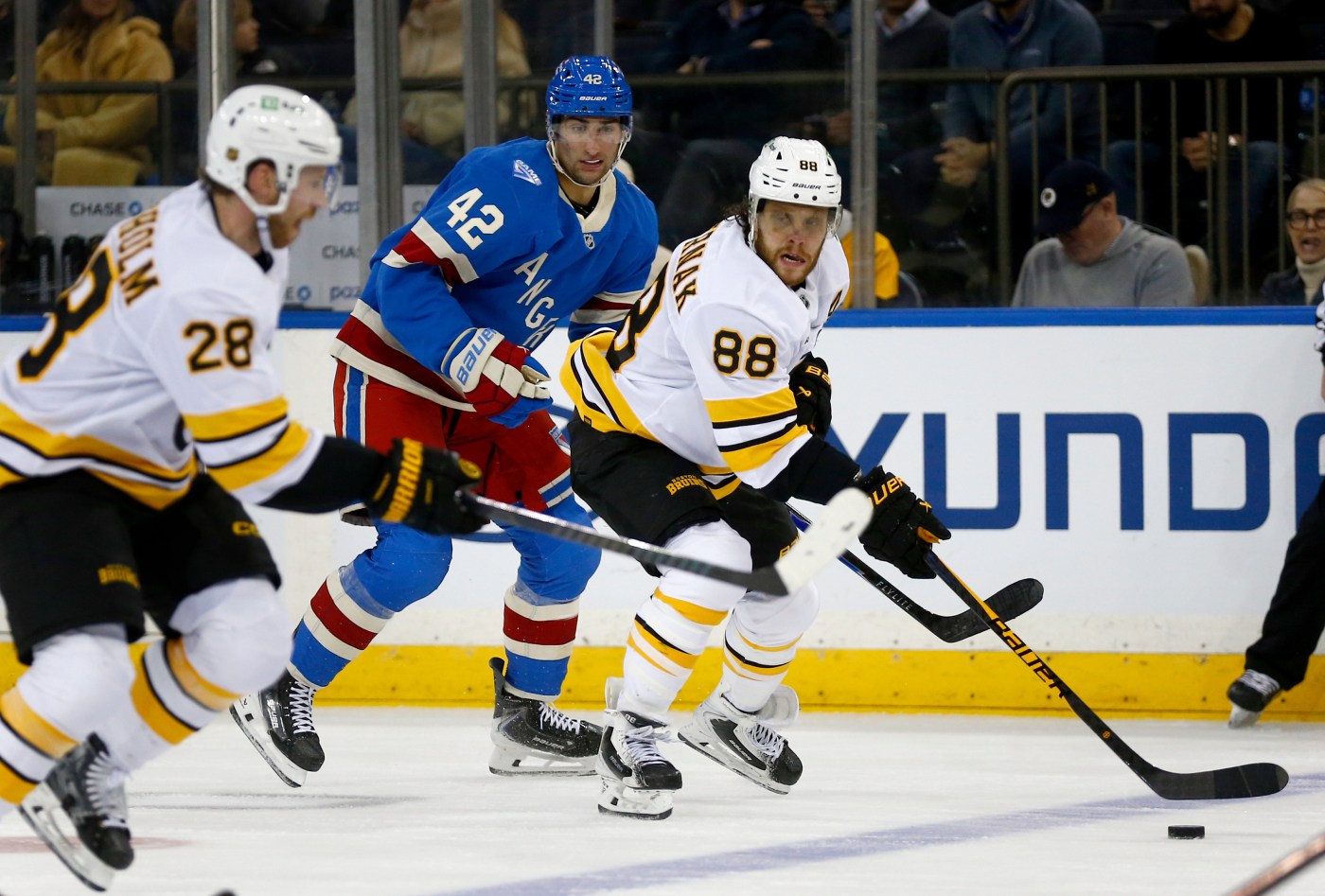 Bruins cough up point, lose in OT to Rangers
