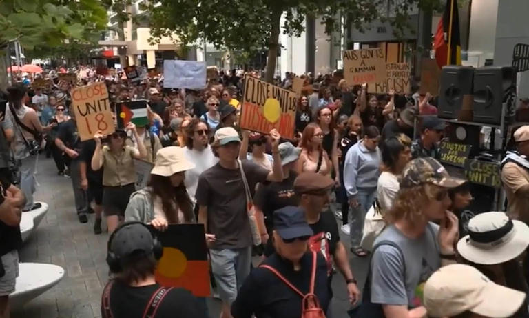 Invasion Day rally evacuated after bomb scare as man is taken into custody