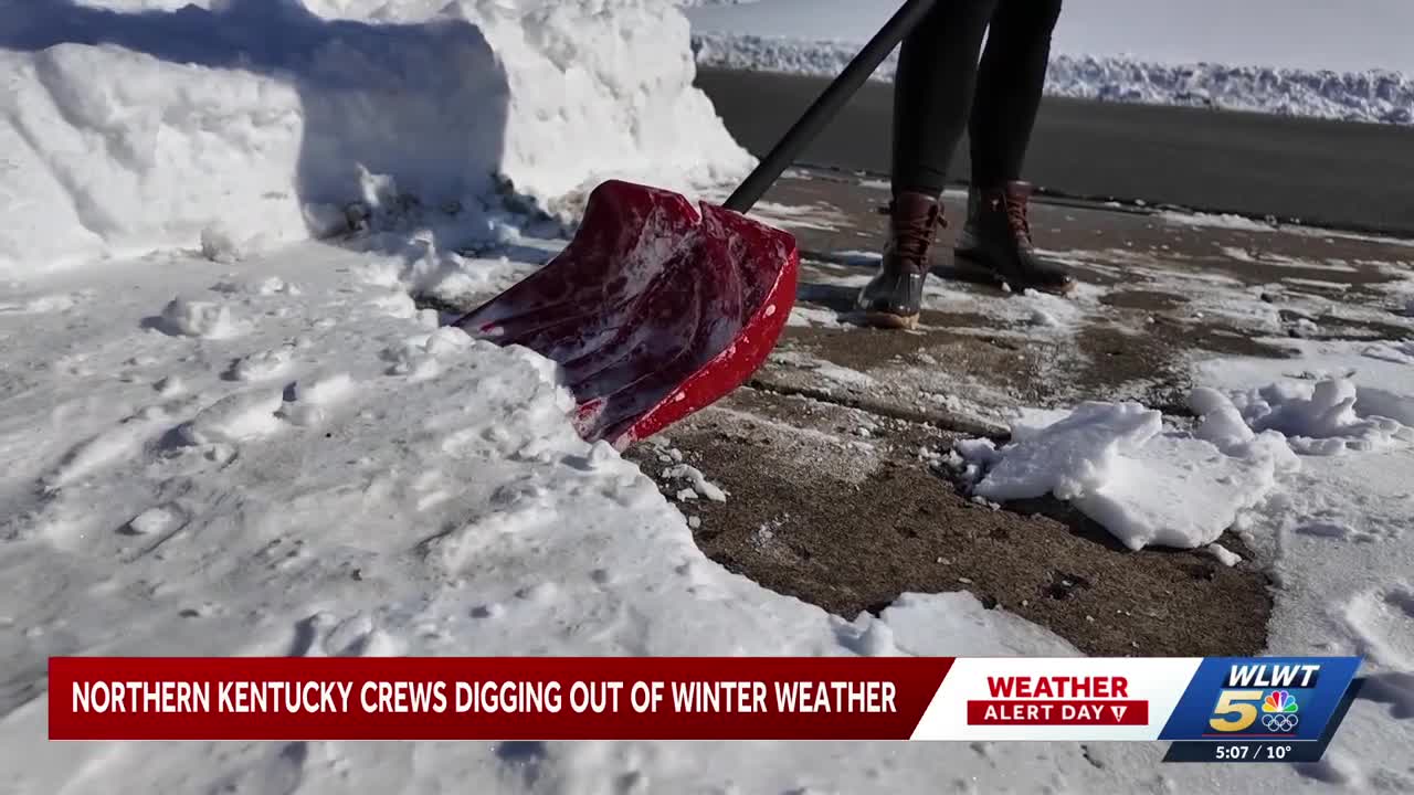 Northern Kentucky residents tackle snow-packed driveways and sidewalks