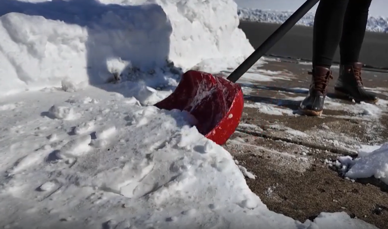 Northern Kentucky residents tackle snow-packed driveways and sidewalks