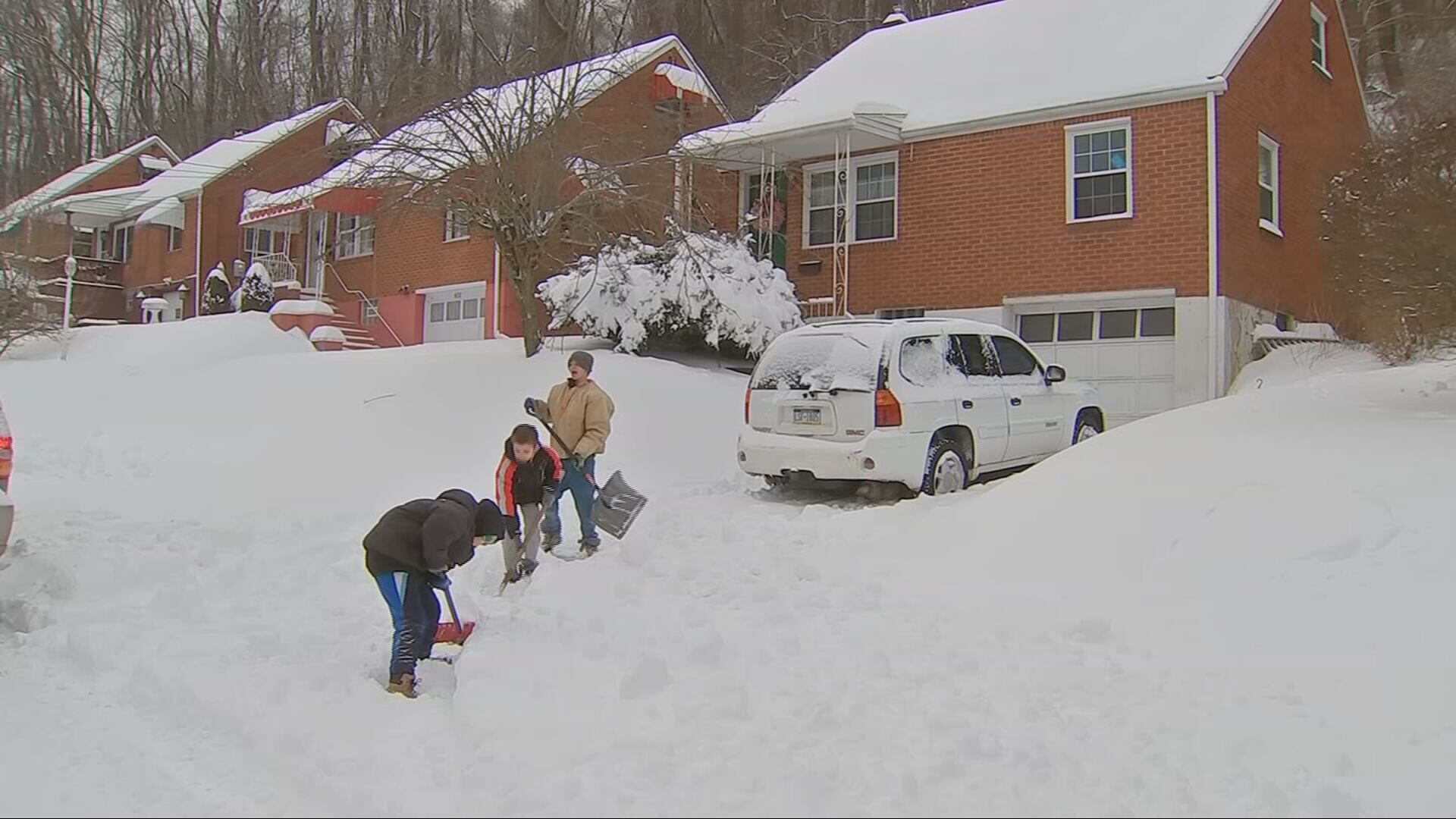 Plow crews and neighbors clear parking lots and driveways in ...