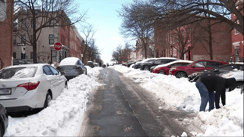 Baltimore digs out after powerful winter storm, cleanup continues on ...