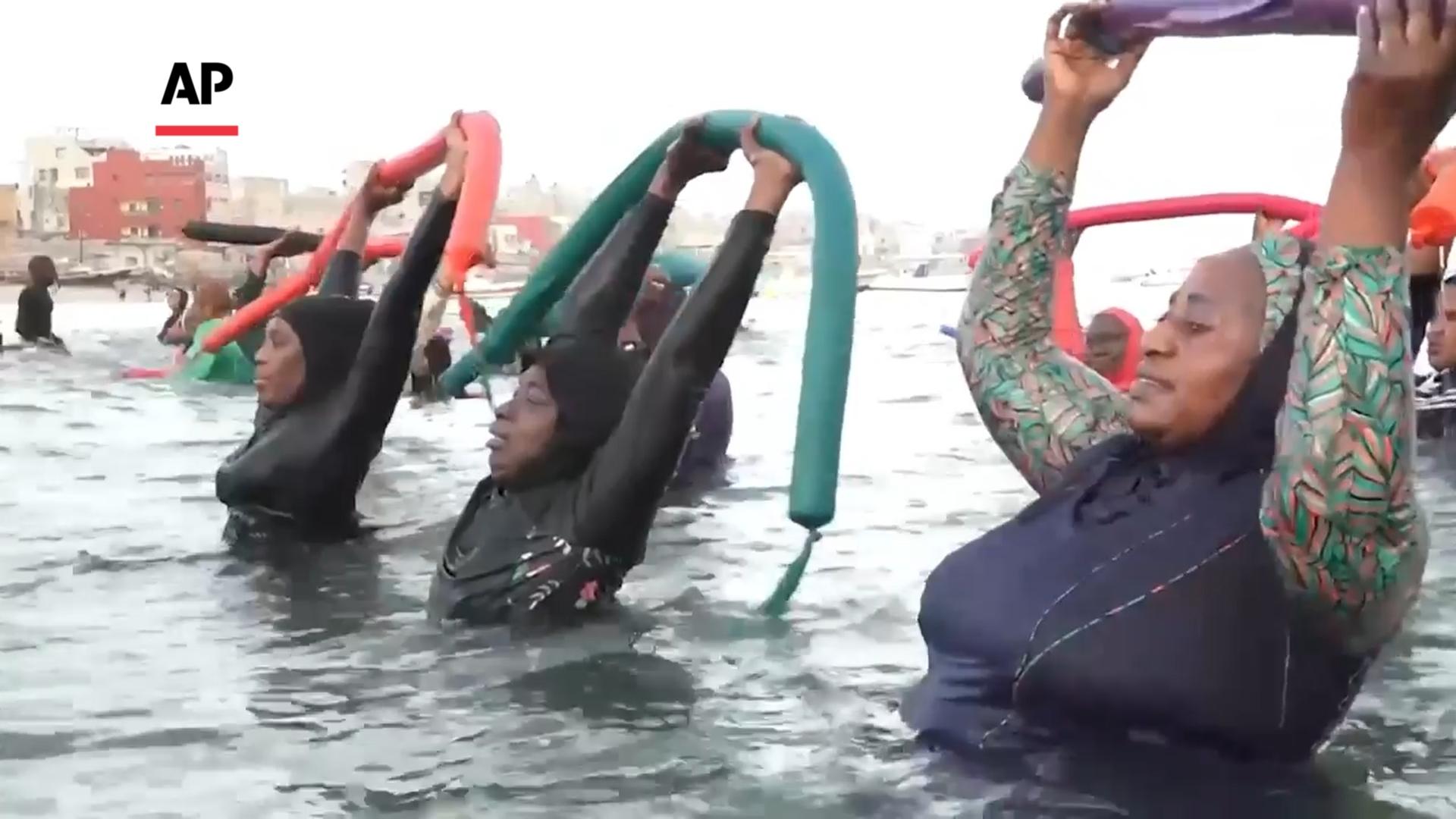 Senegal beach gym offers hope and healing through exercise in the waves