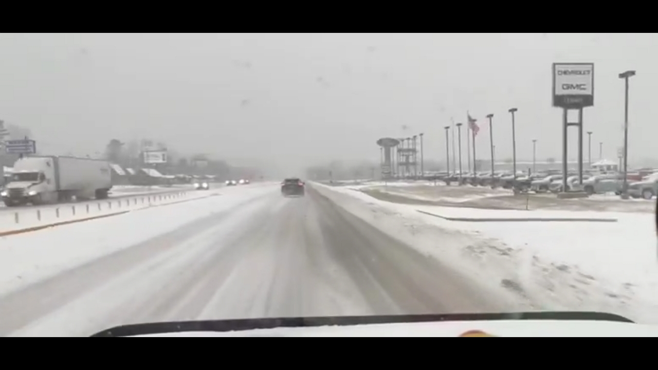Heavy snow creates hazardous travel on US Route 25-E in Knox, Kentucky, USA