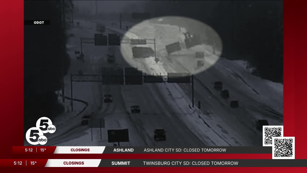 Truck loses control on I-77, brings down highway signs