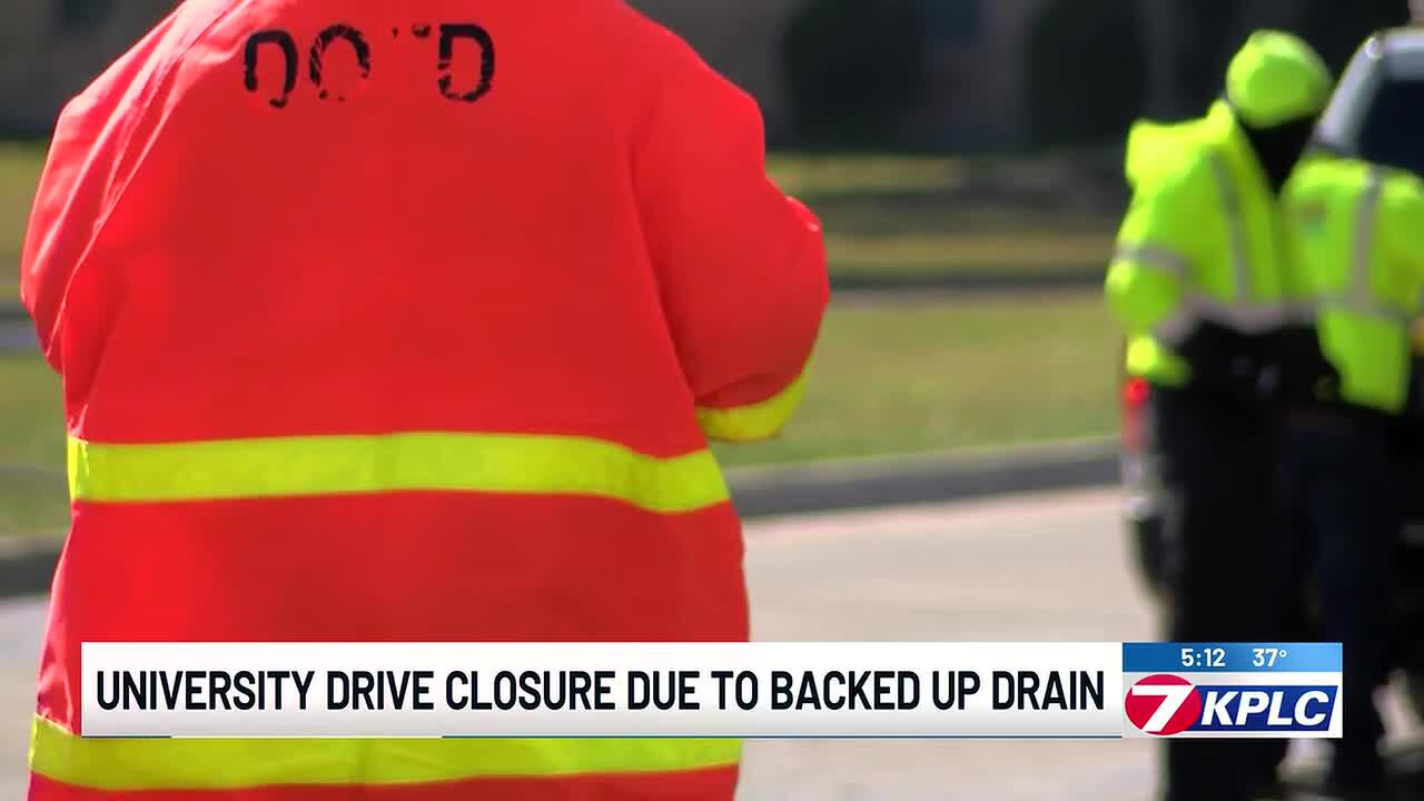 University Drive reopens after overnight flooding and icing from ...
