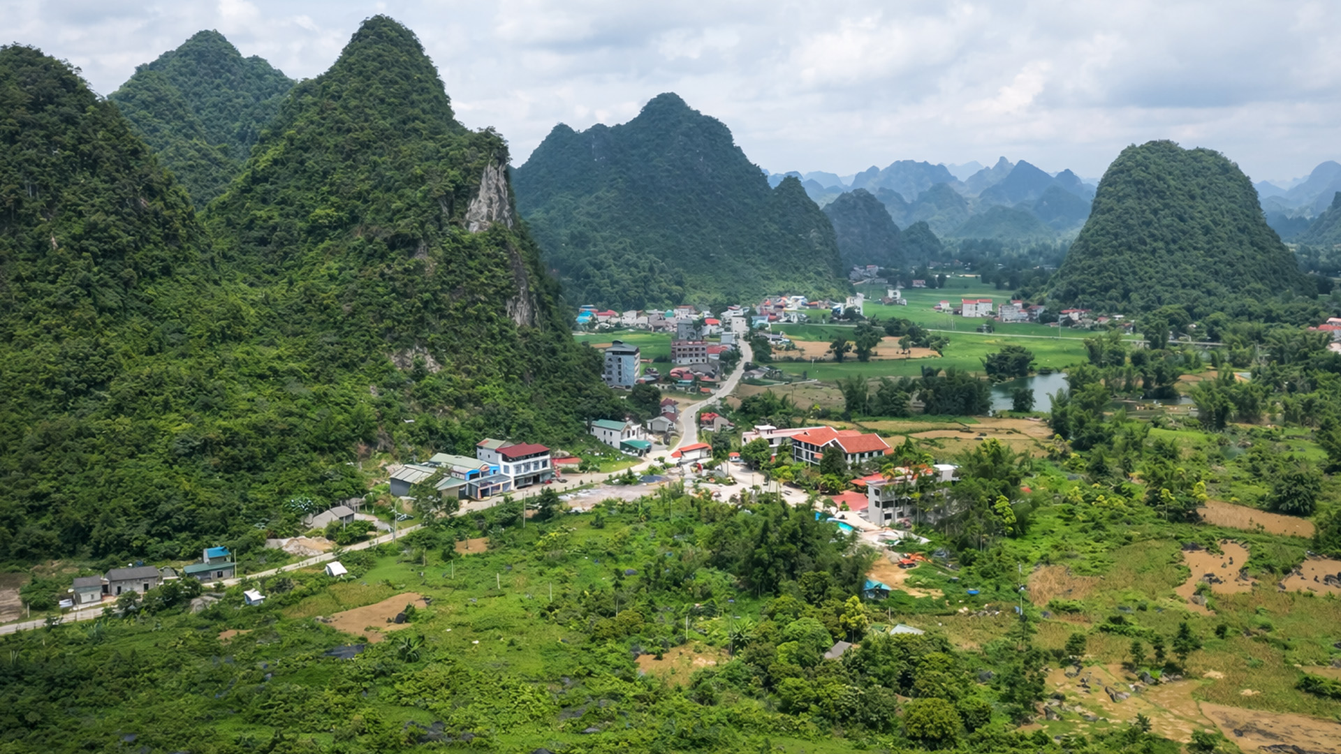 A village surrounded by green walls